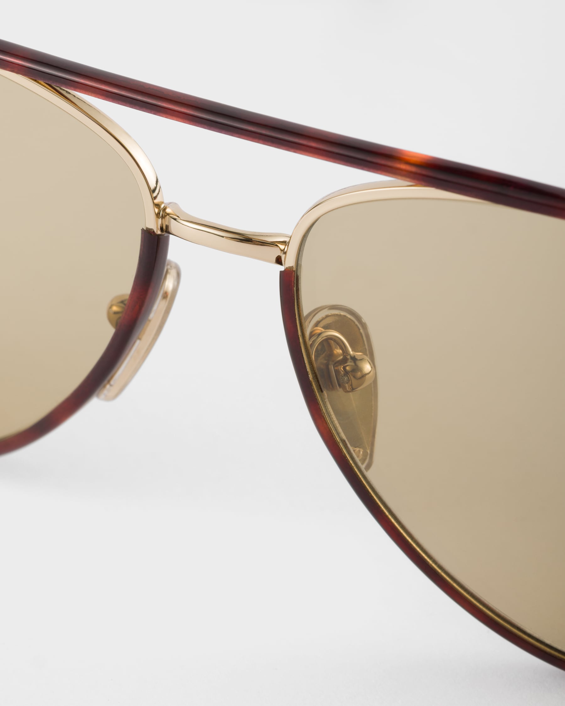 Camomile Lenses Prada Sunglasses With The Iconic Metal Plaque | PRADA