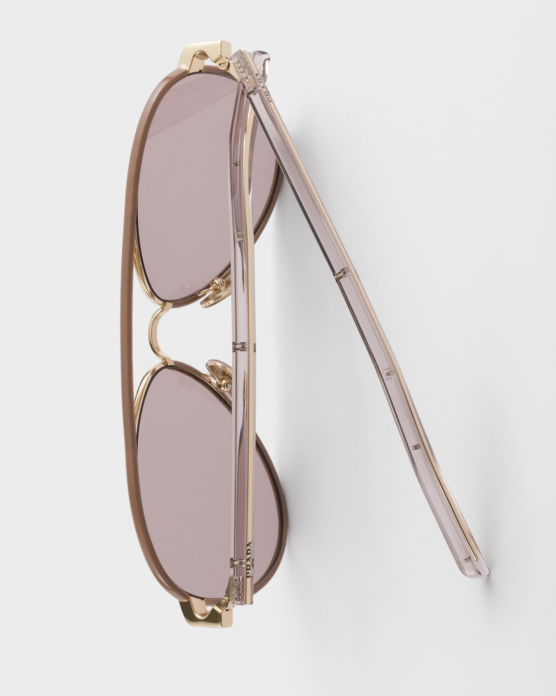 Mauve Lenses Prada Sunglasses With The Iconic Metal Plaque | PRADA