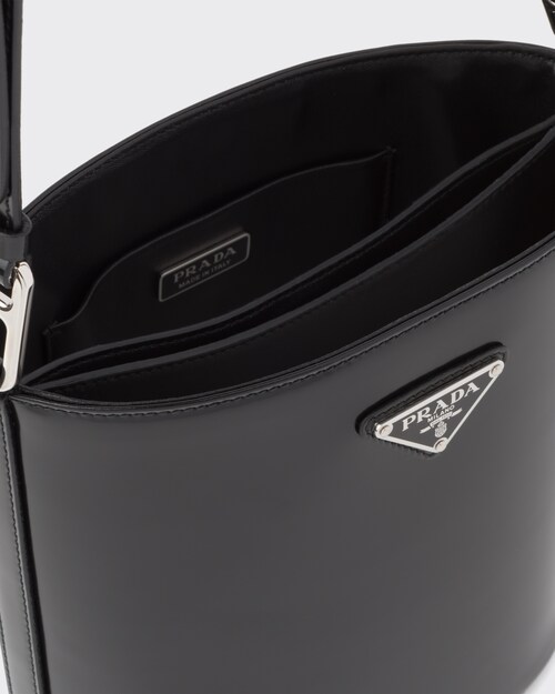 Black Mini brushed-leather bucket bag | Prada