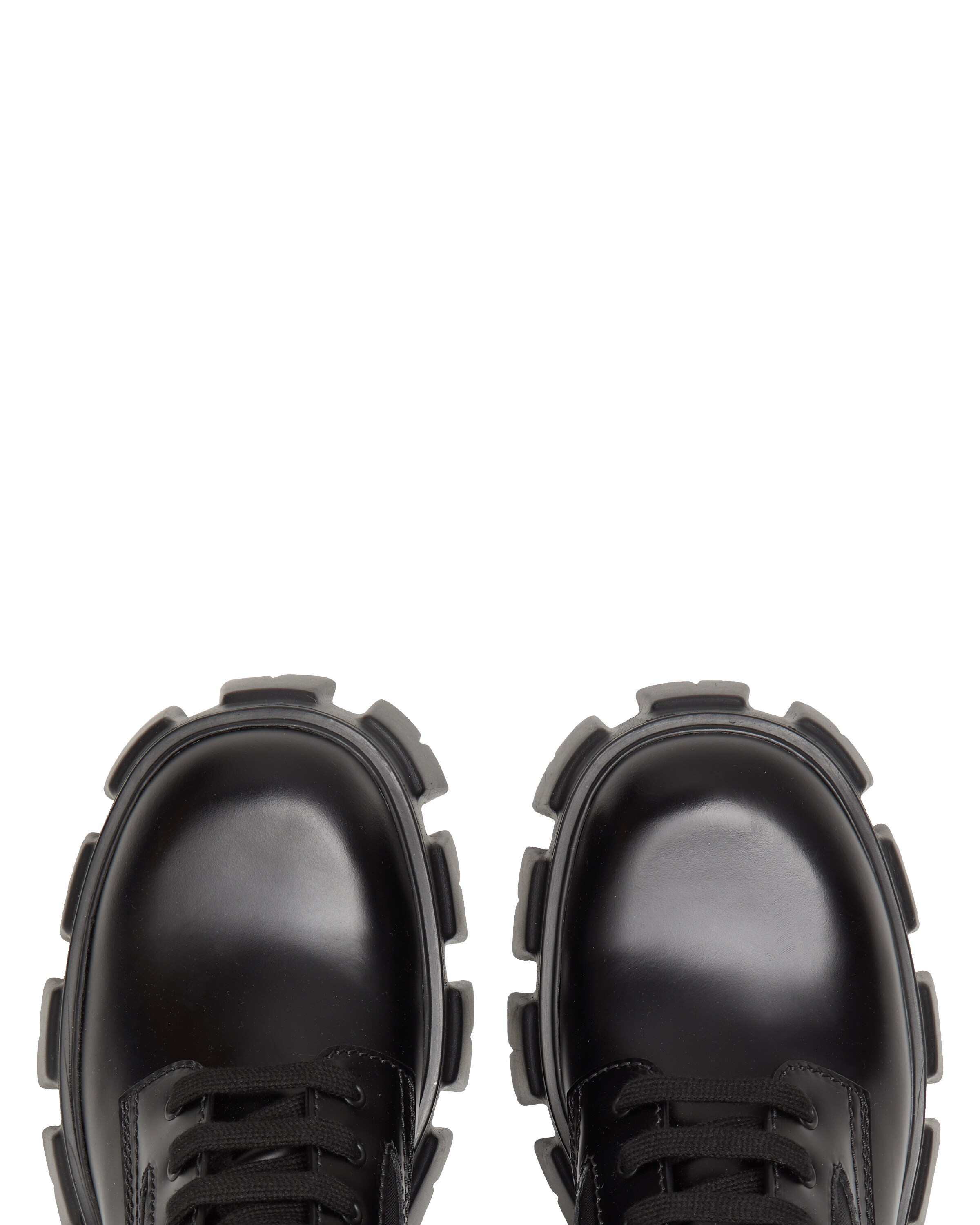 Black Monolith brushed leather and nylon combat boots | Prada
