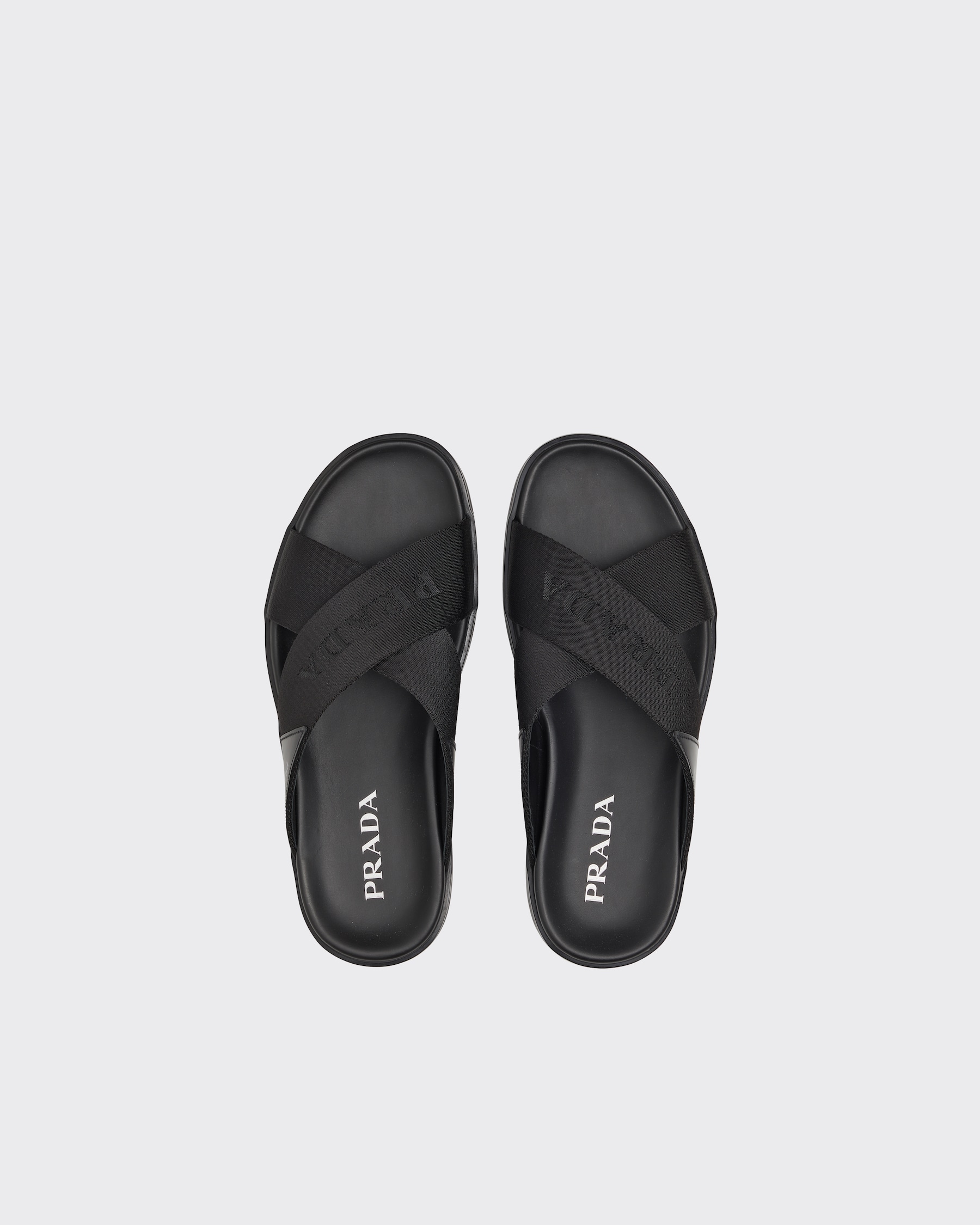 Black Brushed Leather And Re-nylon Tape Crisscross Slides | PRADA