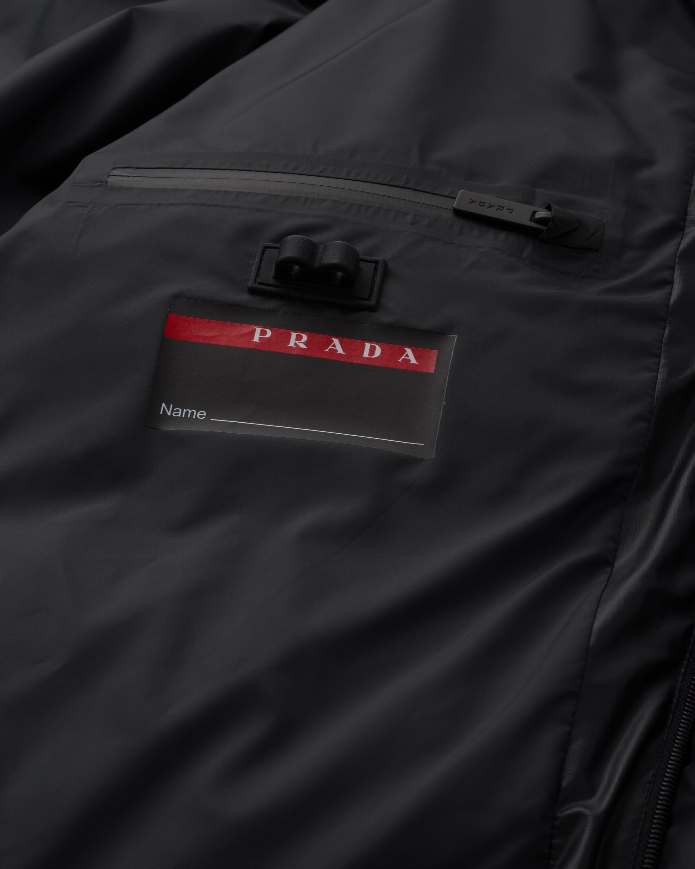Black Light Nylon hooded midi down jacket | Prada